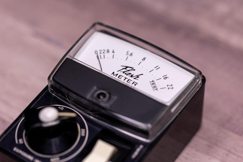 Free Stock Photo of Vintage flash meter with analog display on wooden ...