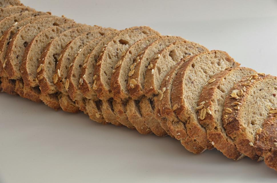 Free Stock Photo of A loaf of sliced bread aligned in a neat row ...