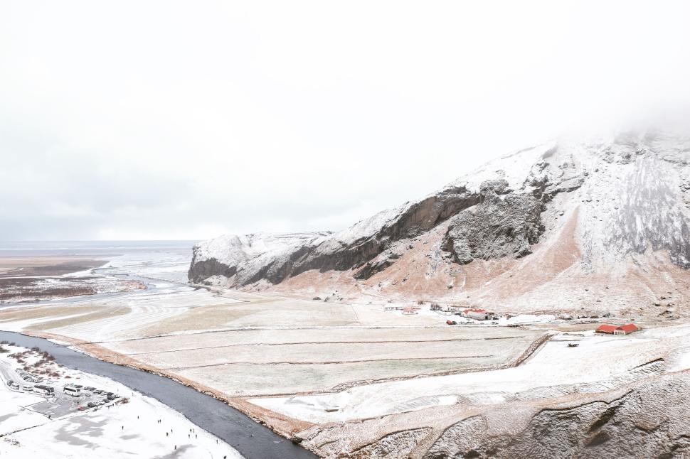 Free Stock Photo of Snow-covered fields near river and rocky mountains ...
