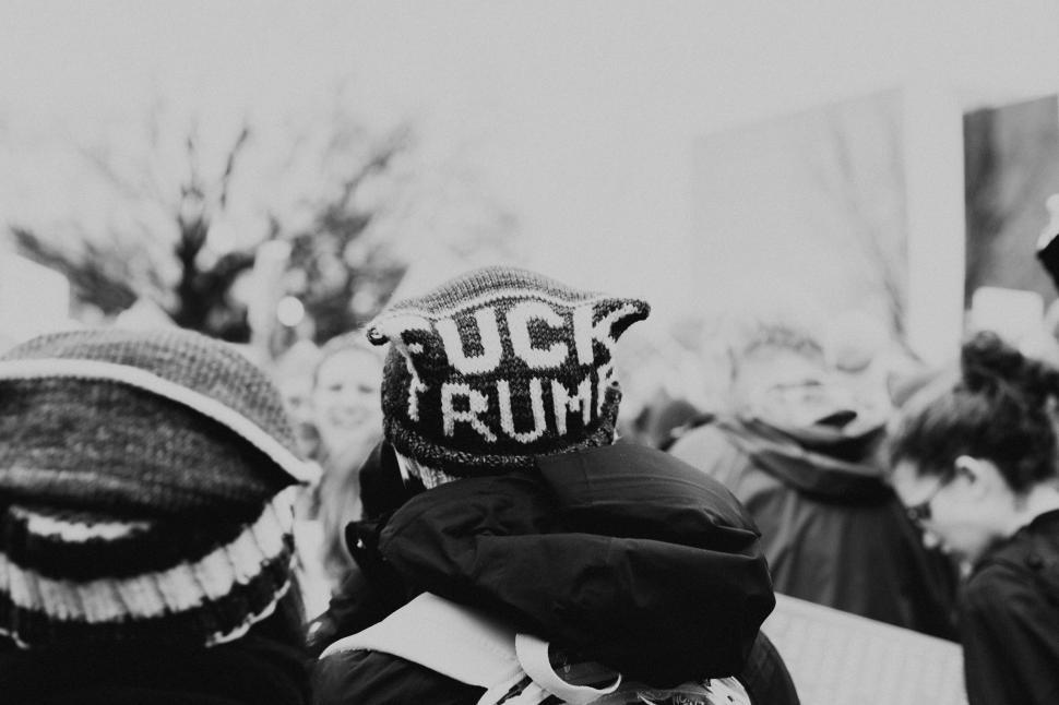 Free Stock Photo of Crowd member in protest wearing a knitted F Trump ...
