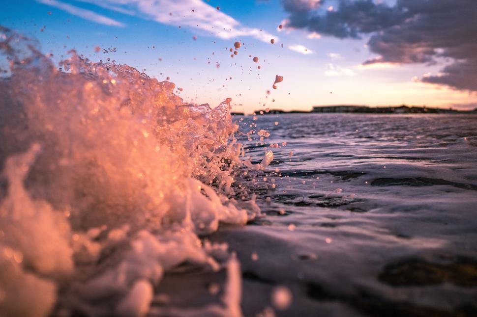 Free Stock Photo of Waves crashing with splash at sunset over ocean ...
