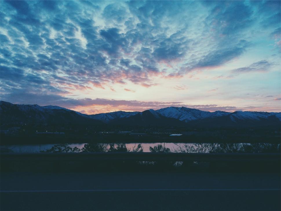 Free Stock Photo of Stunning dusk sky over mountain landscape by a lake ...
