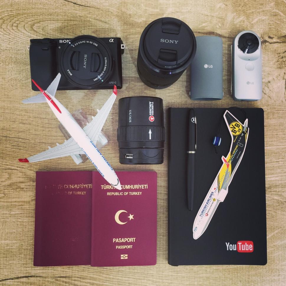 Free Stock Photo of Travel essentials including camera and passport ...