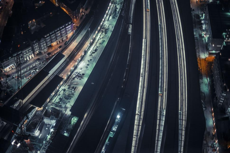 Free Stock Photo of Aerial view of illuminated train tracks at night ...
