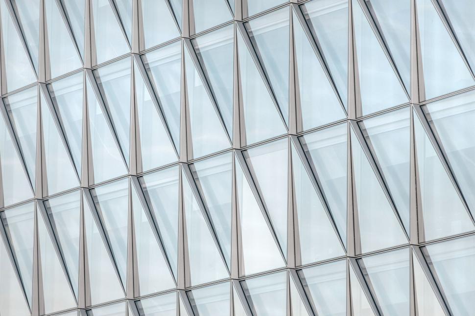 Free Stock Photo of Geometric glass facade with mirrored reflections ...