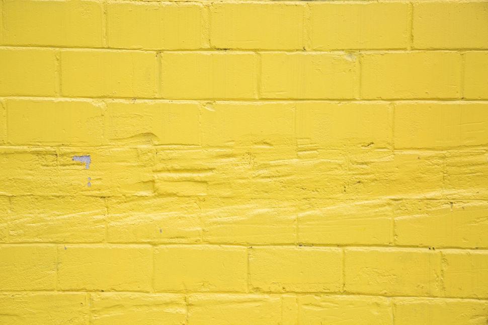 Free Stock Photo of Bright yellow painted brick wall in urban setting ...