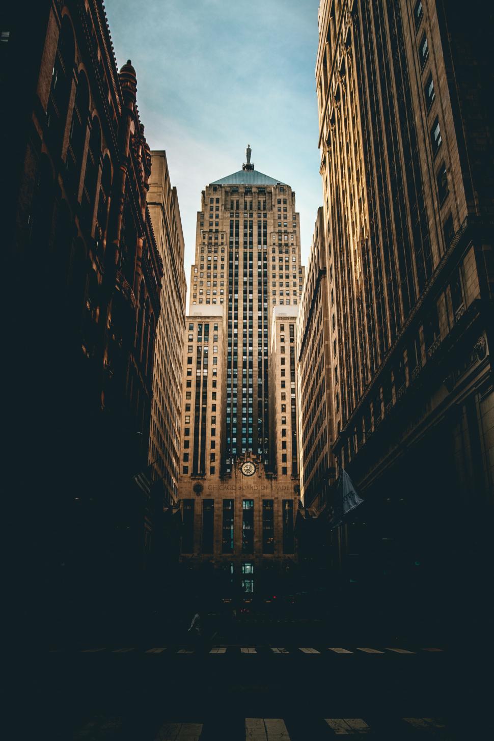 Free Stock Photo of Tall skyscraper surrounded by shadows from nearby ...