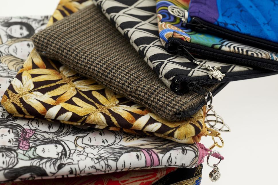 Free Stock Photo of Colorful pouches with various artistic and anime ...
