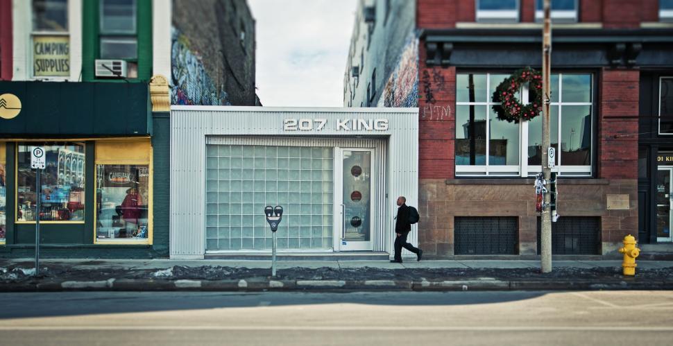 Free Stock Photo of Urban street view featuring a man and a modern ...