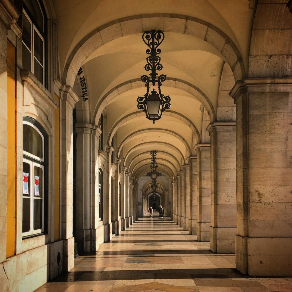 Free Stock Photo of Arched corridor with ornate lights leading to ...