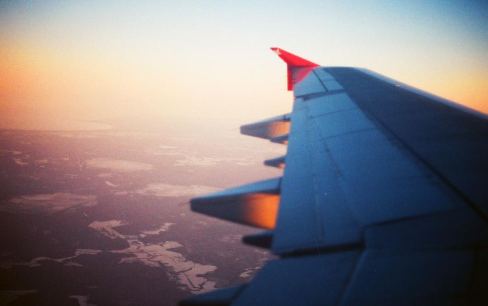 Free Stock Photo of Airplane wing view during flight with sunset colors ...