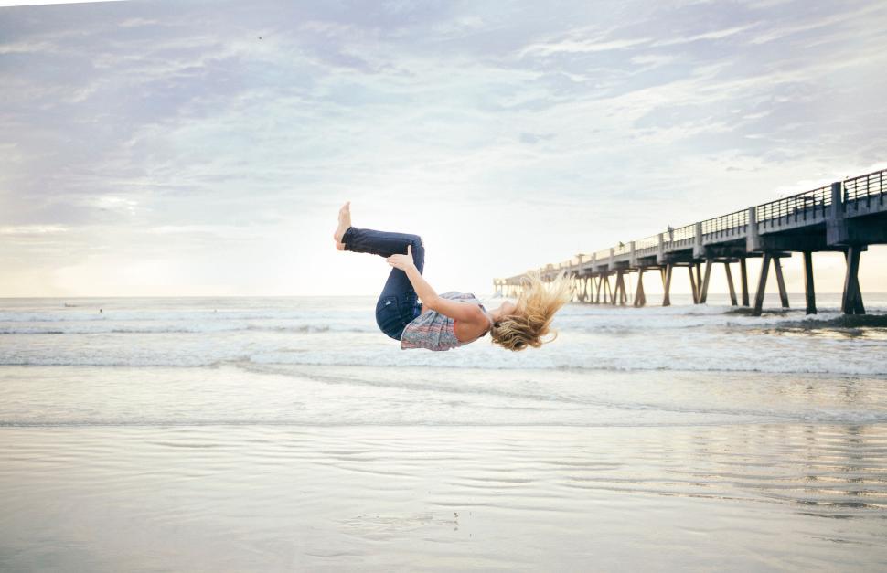 Free Stock Photo of Person performing a mid-air flip at the beach ...
