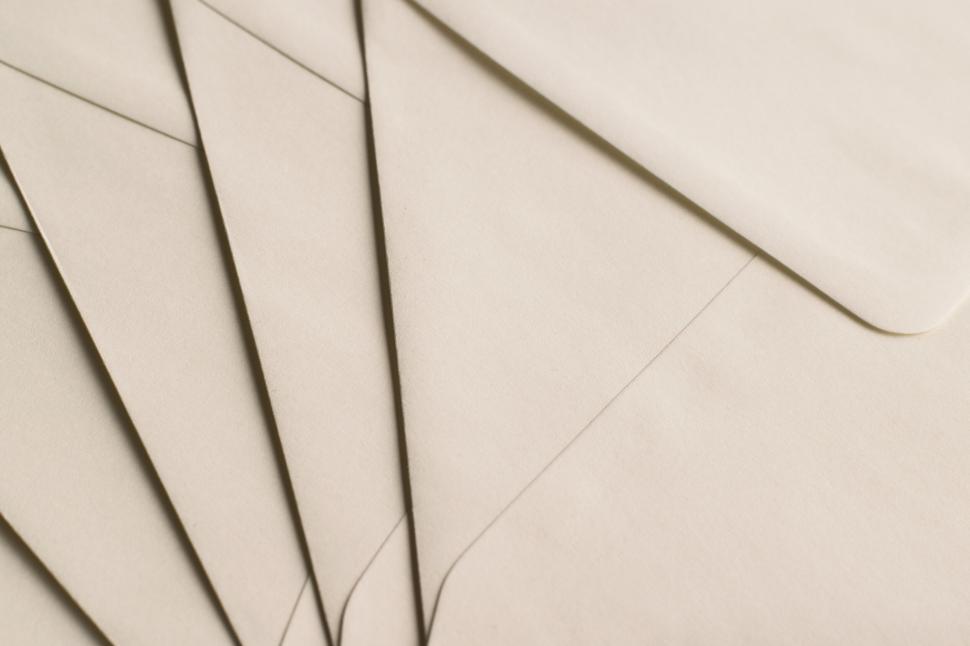 Free Stock Photo of Stack of neutral-colored envelopes in a fanned ...