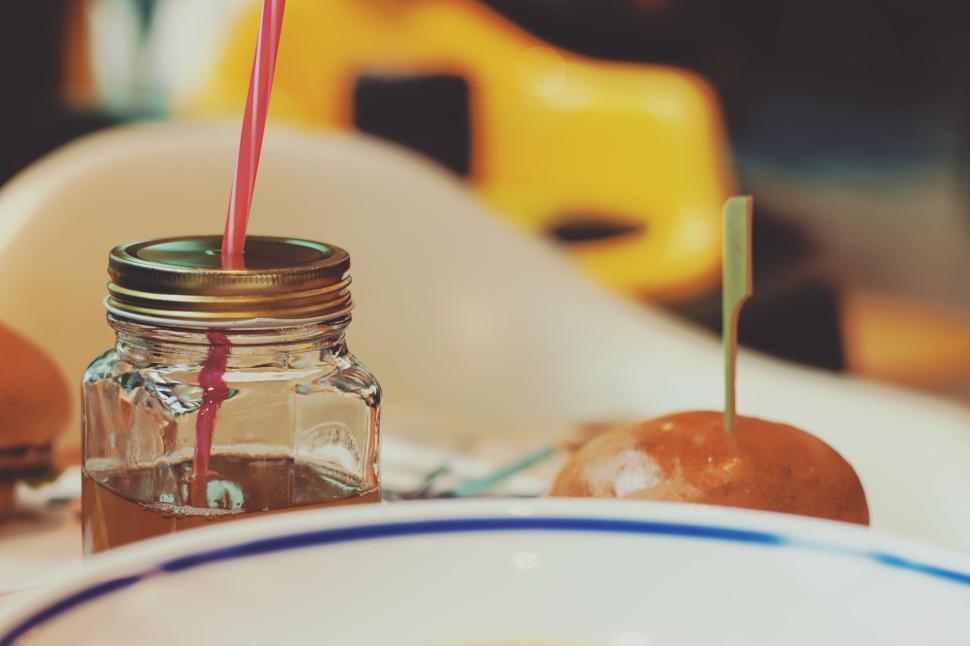 Free Stock Photo of Jar with beverage and burger with lid on a table ...