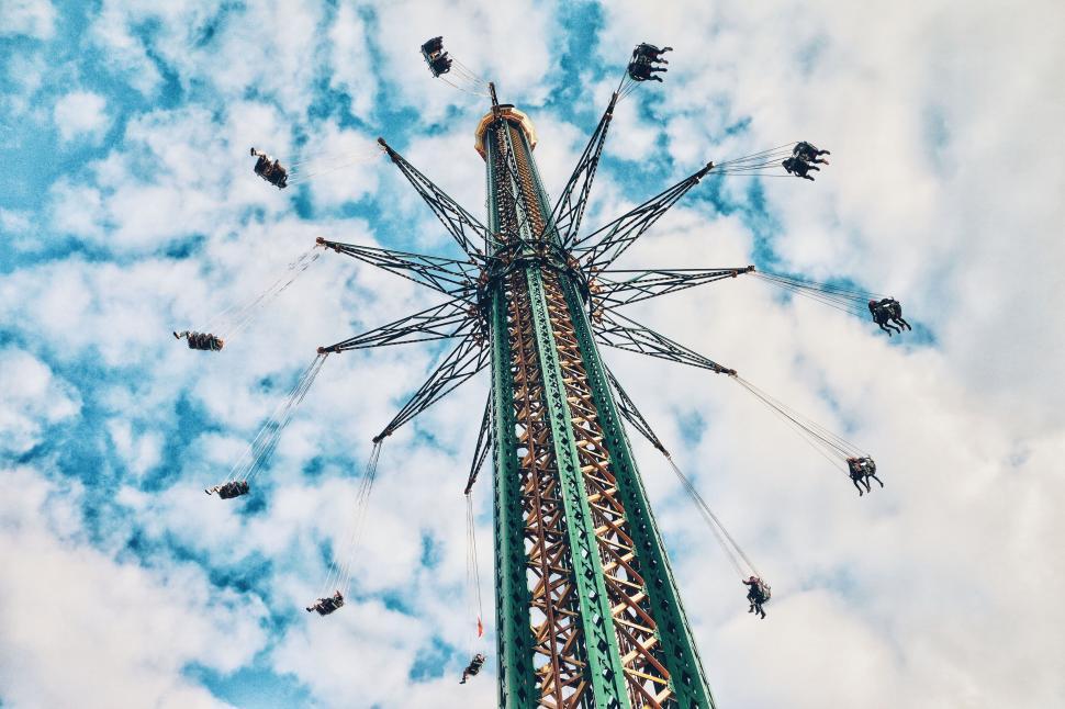 Free Stock Photo of Colorful amusement park swing ride against blue sky ...
