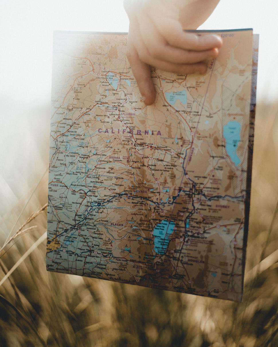 Free Stock Photo of Hand holding a detailed map of California outdoors ...