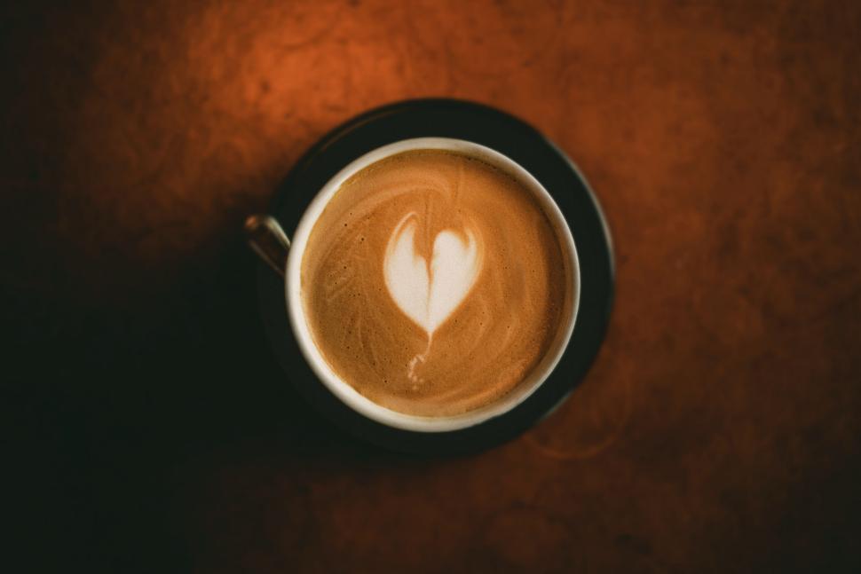 Free Stock Photo of Latte art in a cup on a dark brown surface ...
