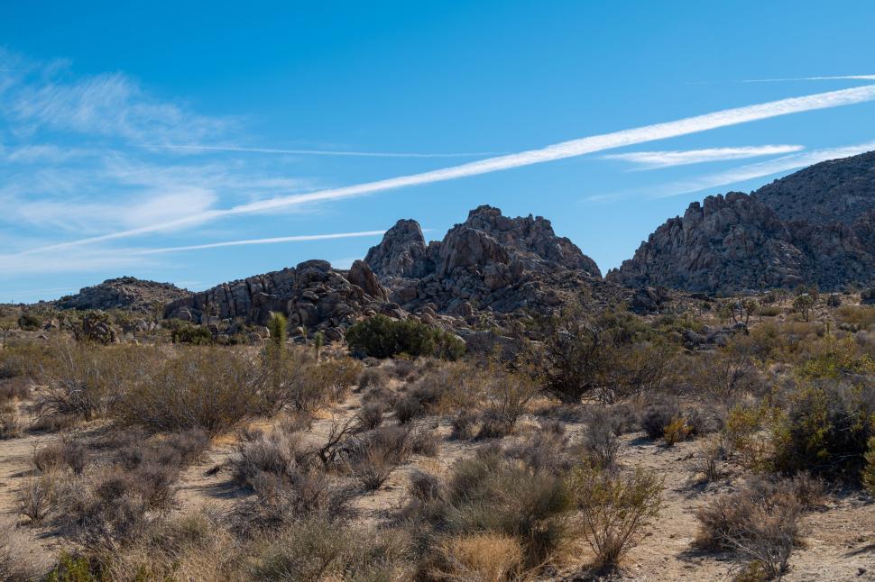Free Stock Photo of Rocky desert landscape under clear blue sky ...