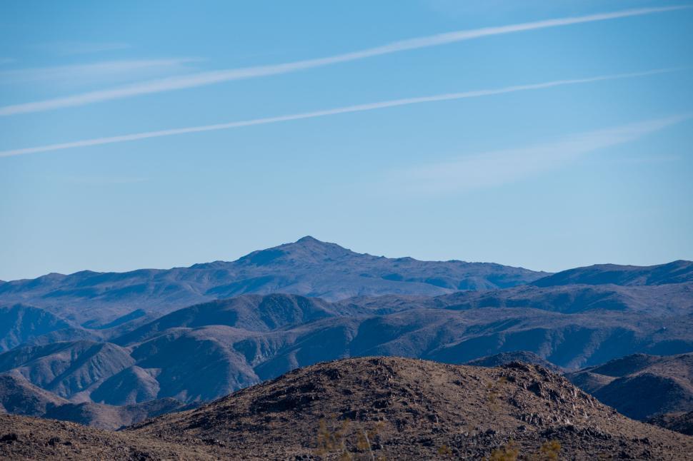 Free Stock Photo of Mountainous terrain under a sunny clear blue sky ...