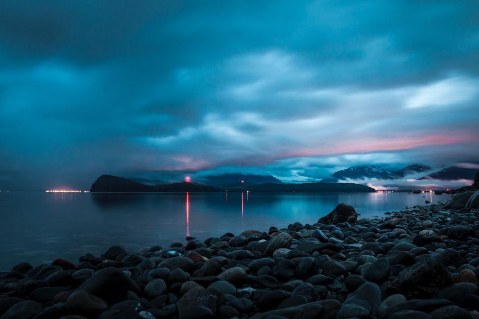 Free Stock Photo of A beautiful scenic view of a calm, misty coastal ...