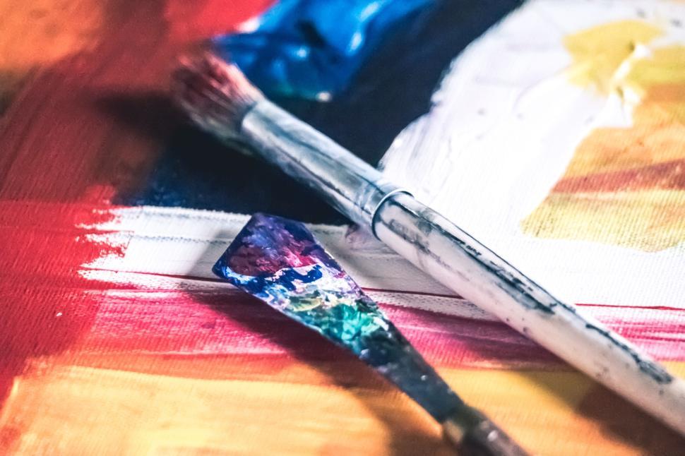 Free Stock Photo of Messy paintbrushes and tools on an artist s canvas ...