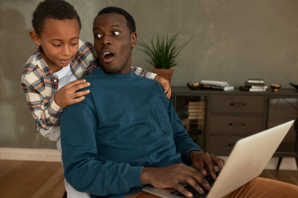 Free Stock Photo of Dark-skinned male in blue jumper sitting in chair ...