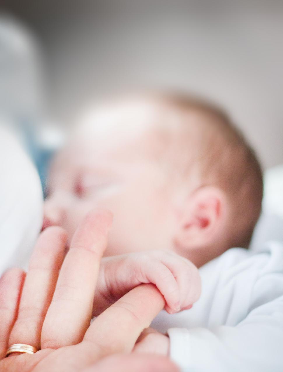 Free Stock Photo of Newborn baby holding adult s finger gently ...