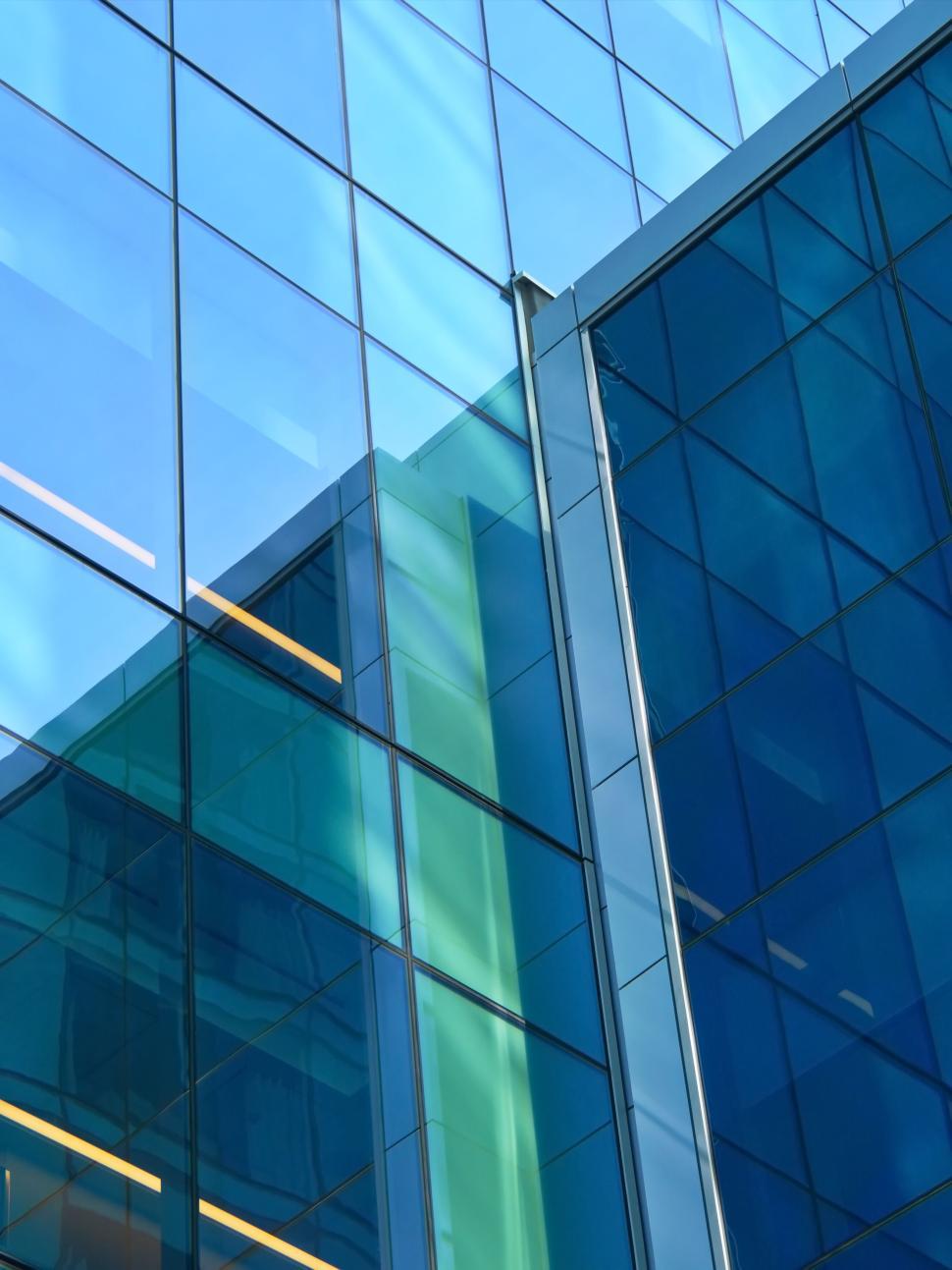 Free Stock Photo of Modern glass building with abstract reflections sky ...