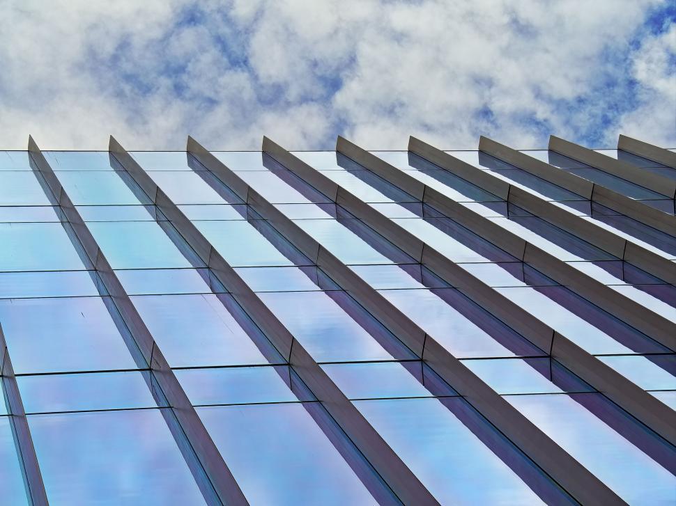 Free Stock Photo of Glass building with architectural fins against ...