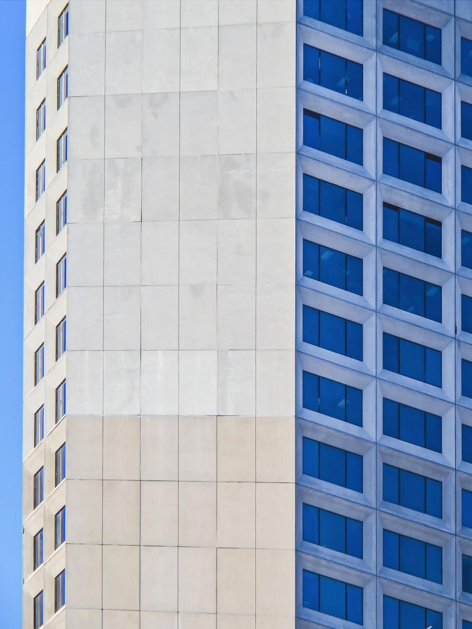 Free Stock Photo of High-rise building with diverse window designs ...