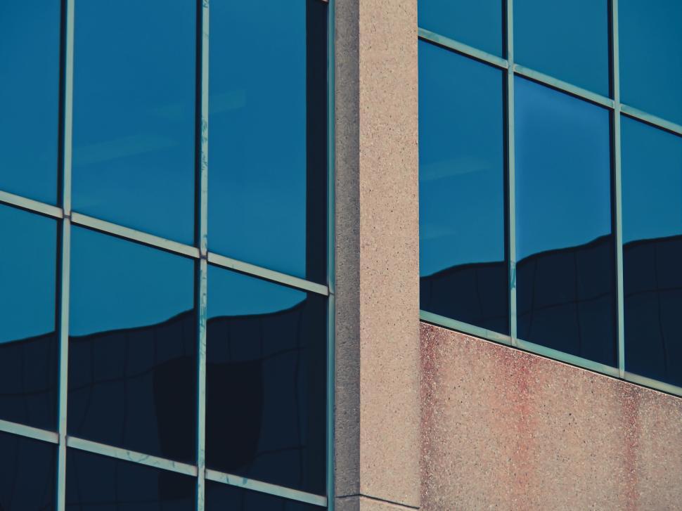 Free Stock Photo of Facade of a modern building with large reflective ...