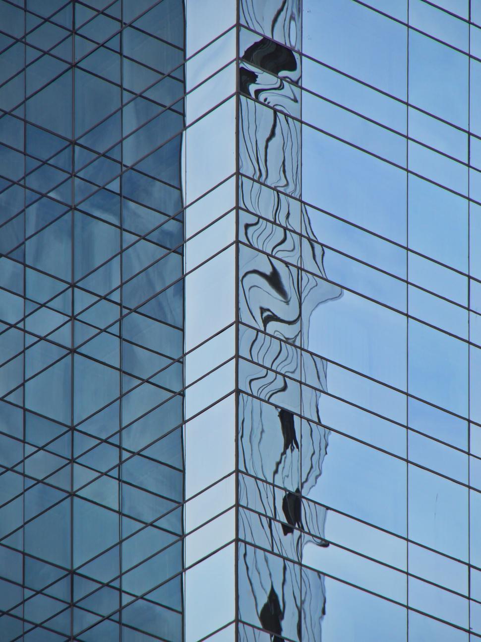 Free Stock Photo of Reflective glass facade of a skyscraper showcasing ...