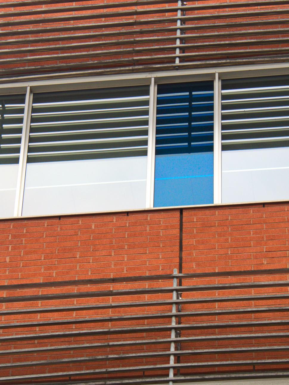 Free Stock Photo of Brick facade with unique blue accent window and ...