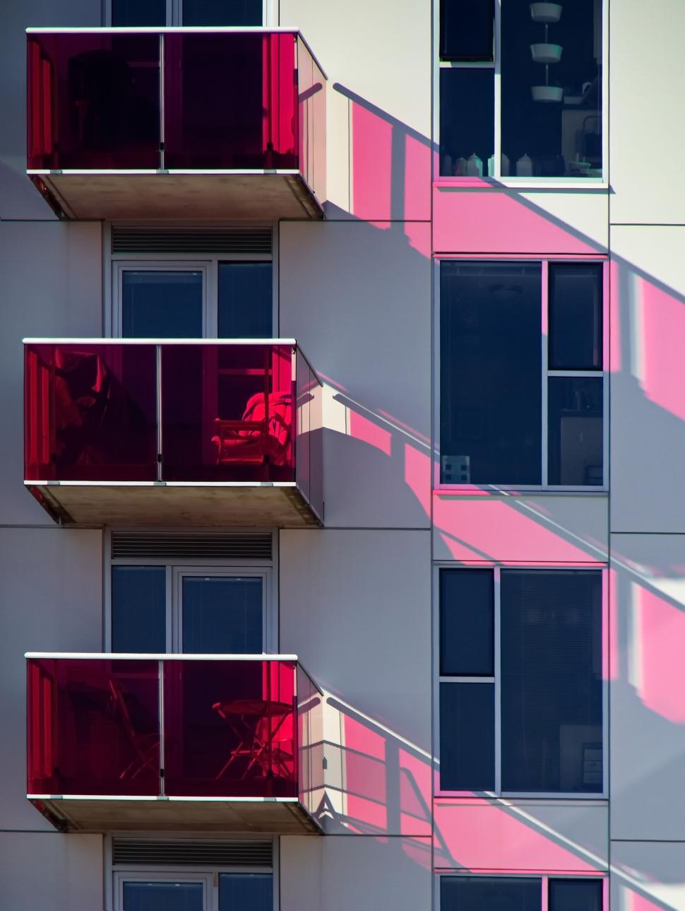 Free Stock Photo of Modern building with red balconies and shadow ...