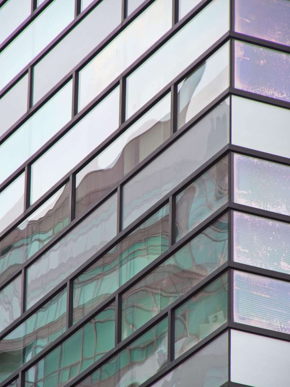 Free Stock Photo of Window reflections on glass facade of modern ...
