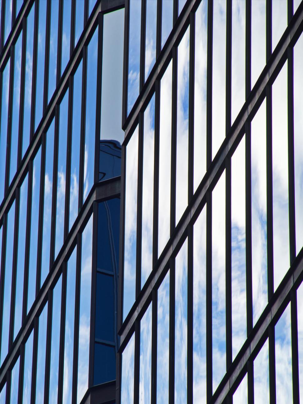 Free Stock Photo of Reflective glass building with blue sky reflections ...
