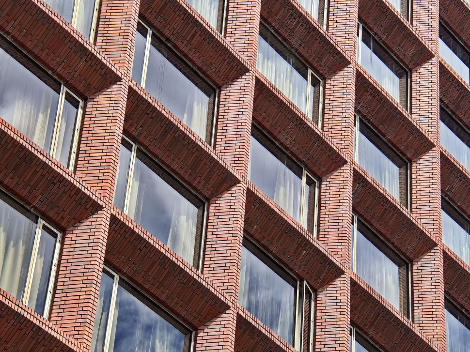 Free Stock Photo of Brick building with indent windows in repetitive ...
