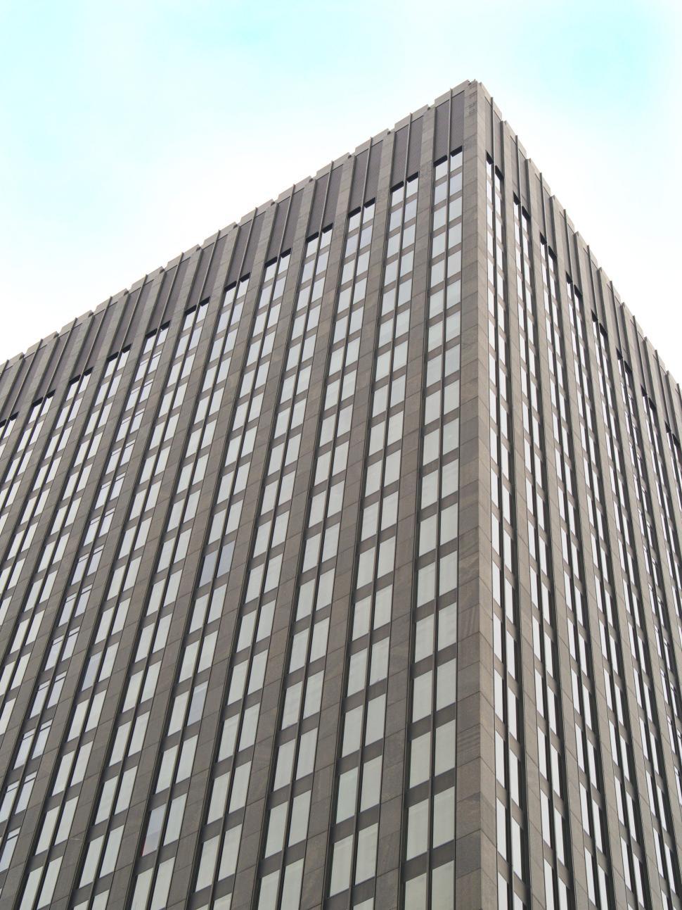 Free Stock Photo of Tall skyscraper with repetitive windows in modern ...