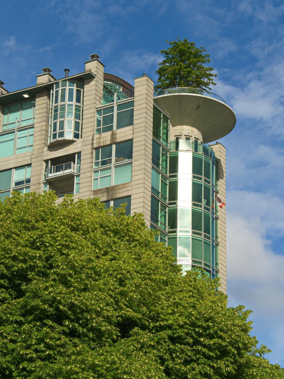 Free Stock Photo of Green rooftop garden atop a modern high-rise ...