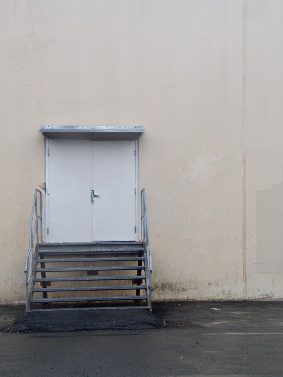 Free Stock Photo of Rear access door with stairs on a plain wall ...