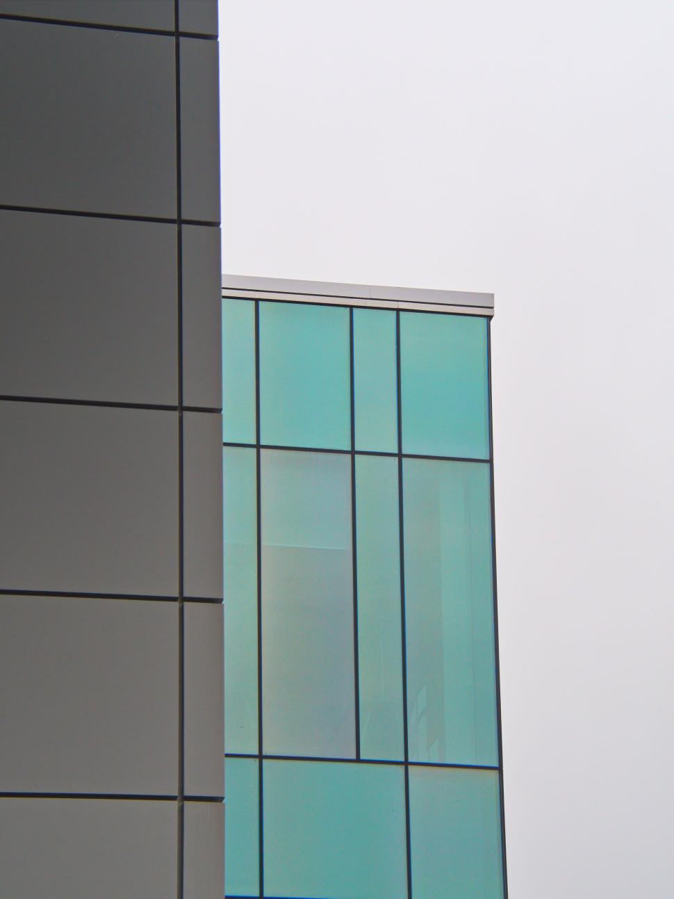 Free Stock Photo of Colorful glass-windowed building section with metal ...