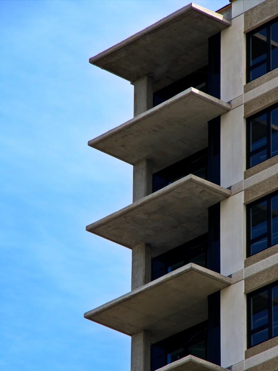 Free Stock Photo of Concrete balconies on a high-rise building s side ...