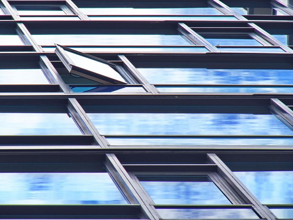 Free Stock Photo of Windows on a high-rise building reflecting the sky ...