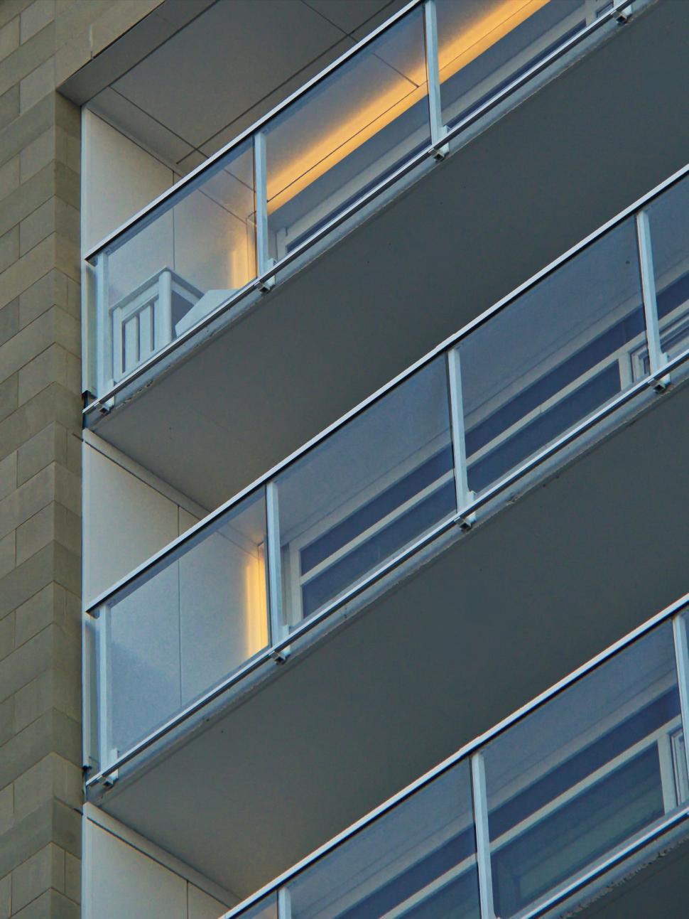 Free Stock Photo of Close-up of modern balcony with glass railings at ...