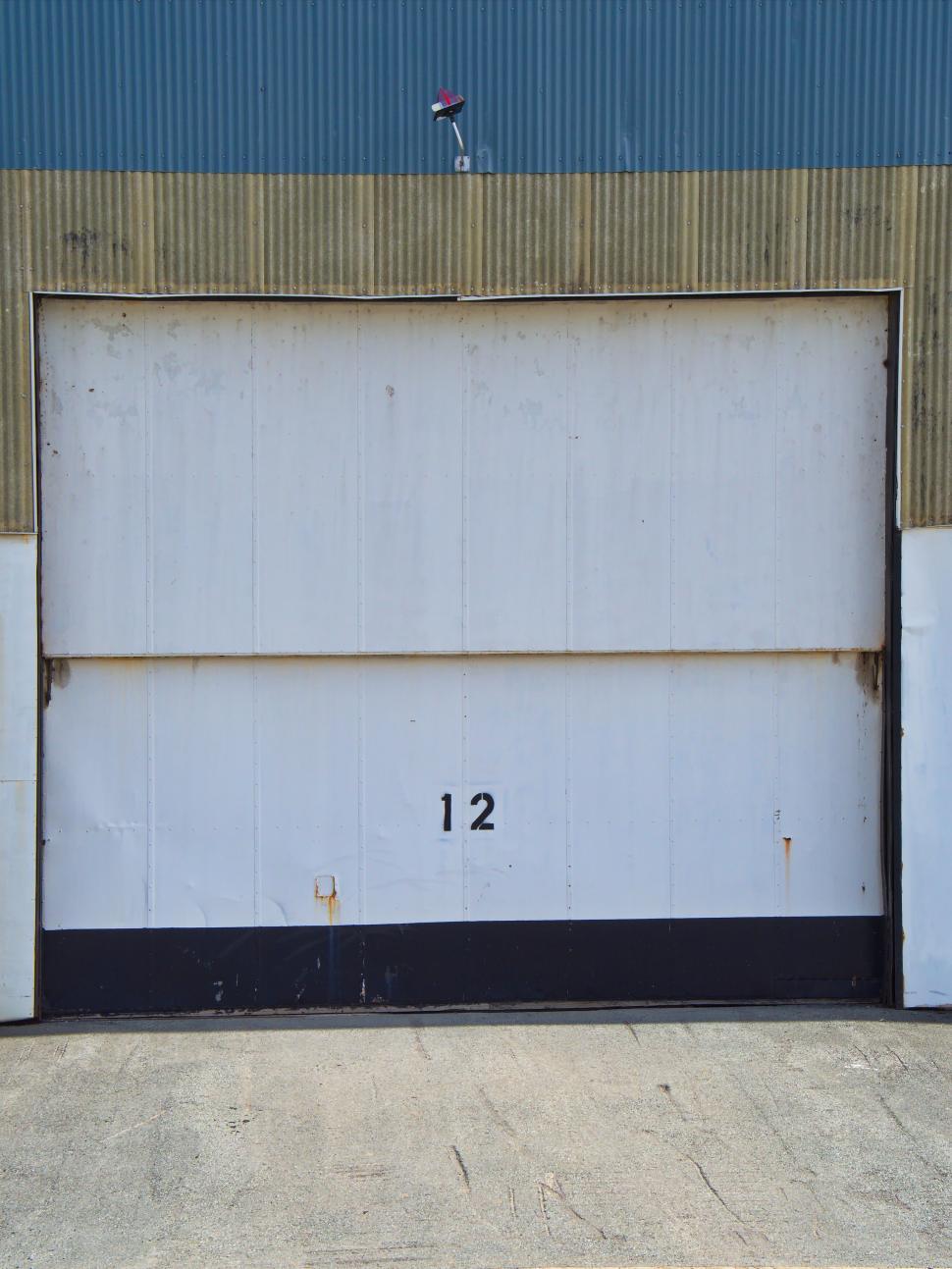 Free Stock Photo of White industrial garage door number 12 warehouse ...