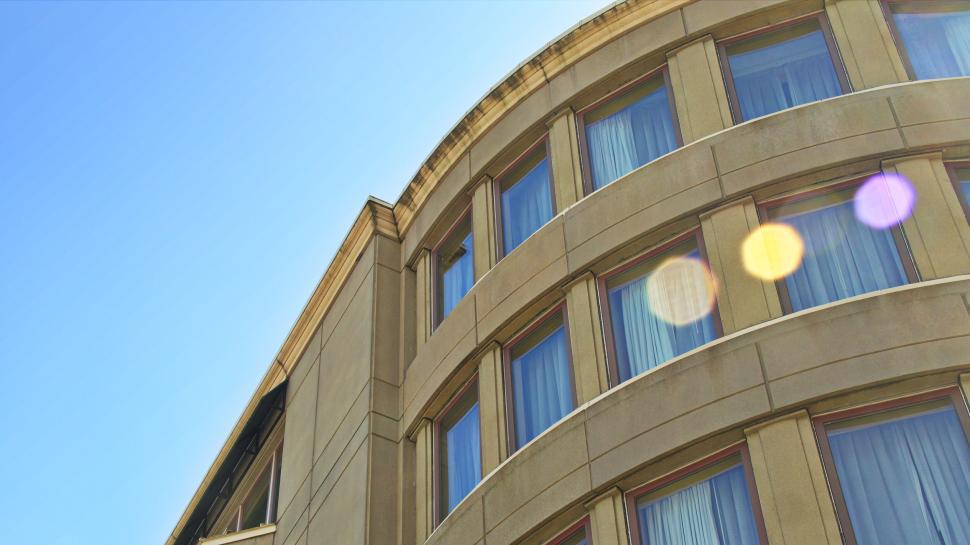 Free Stock Photo of Curved building facade with multiple windows and ...