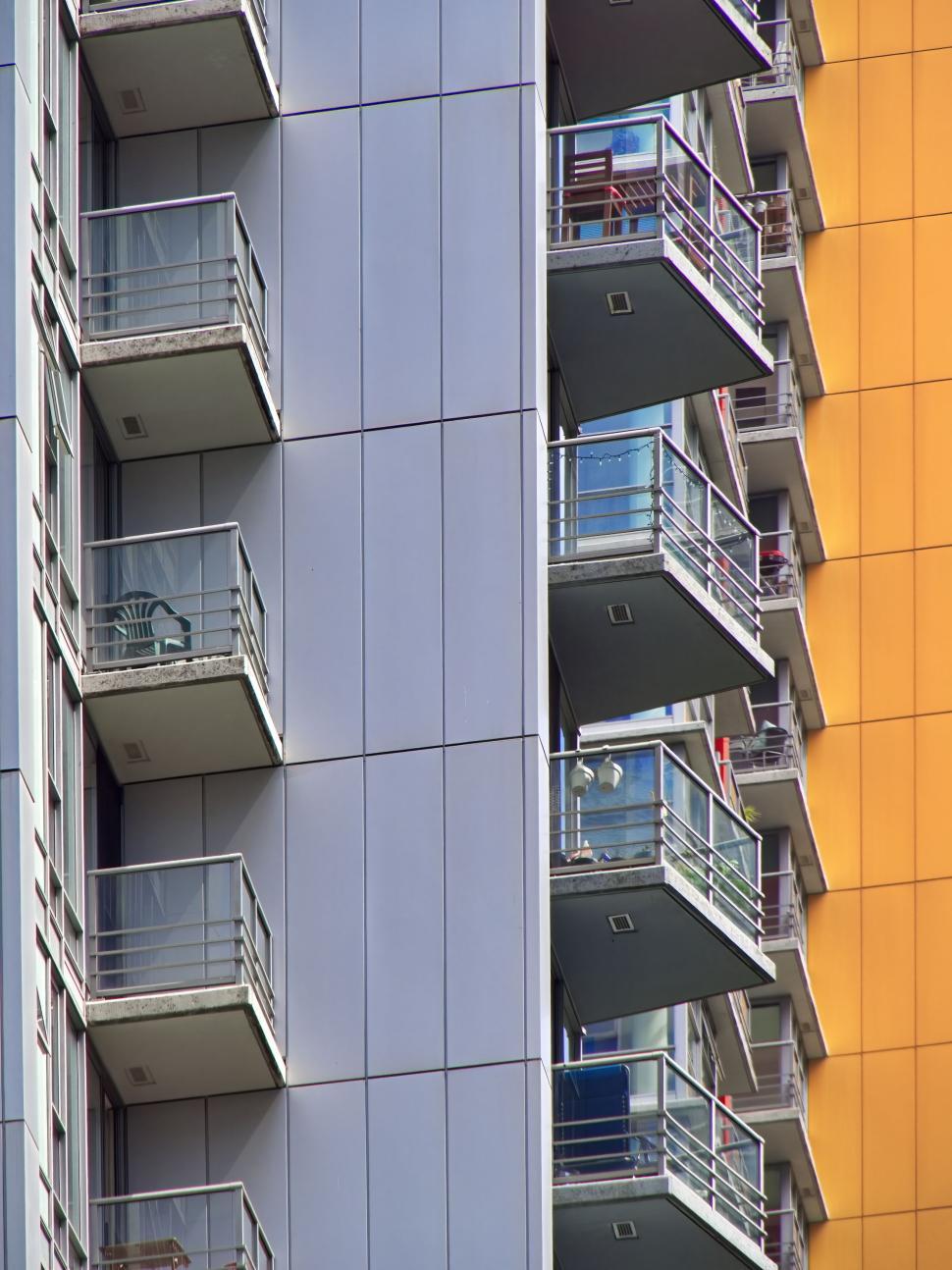 Free Stock Photo of Modern high-rise apartments with balconies and gray ...