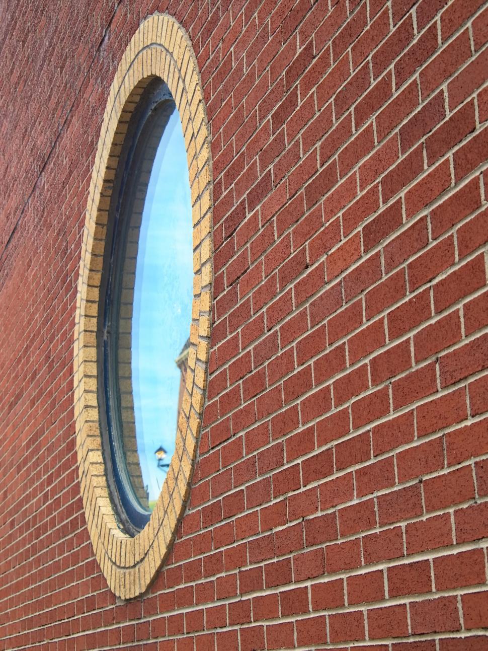 Free Stock Photo of Red brick wall with round window and brick arch ...
