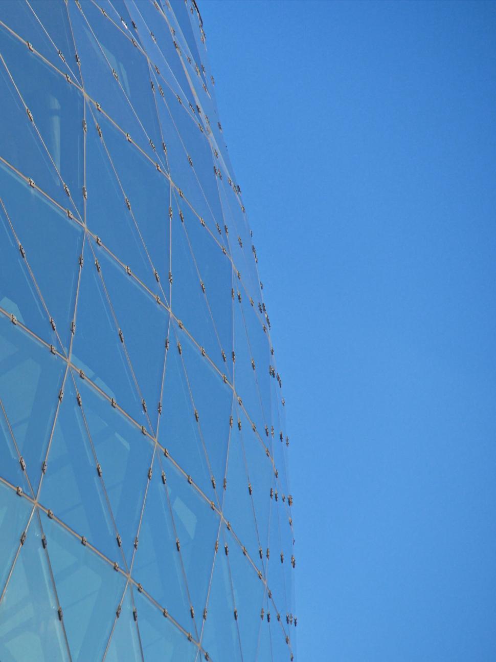Free Stock Photo of Curved glass building with a geometric wireframe ...