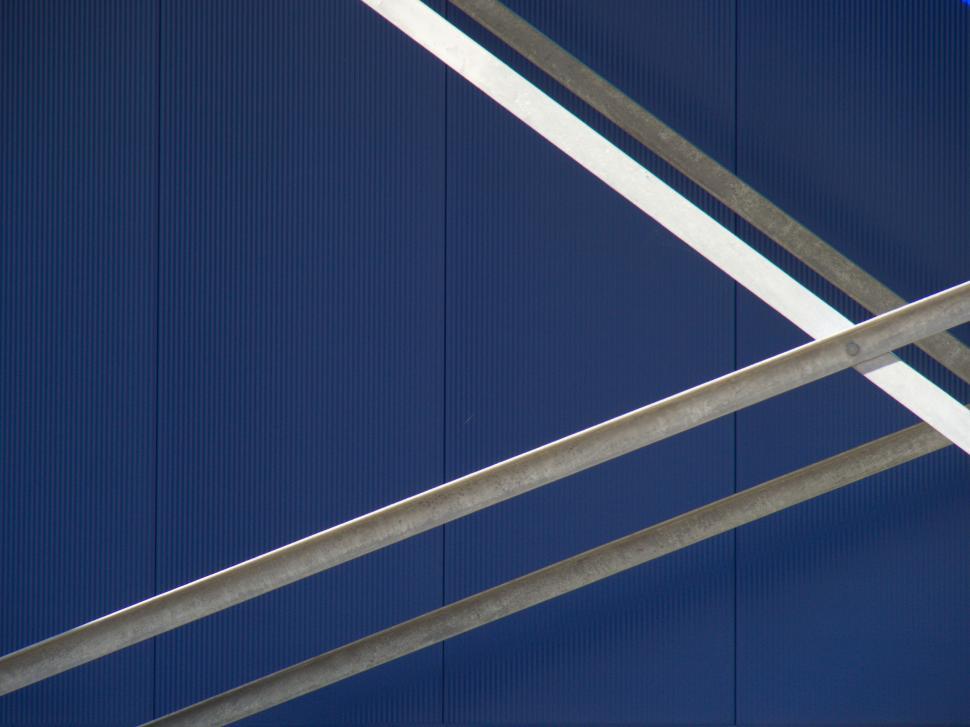 Free Stock Photo of Blue wall with intersecting metal beams, abstract ...